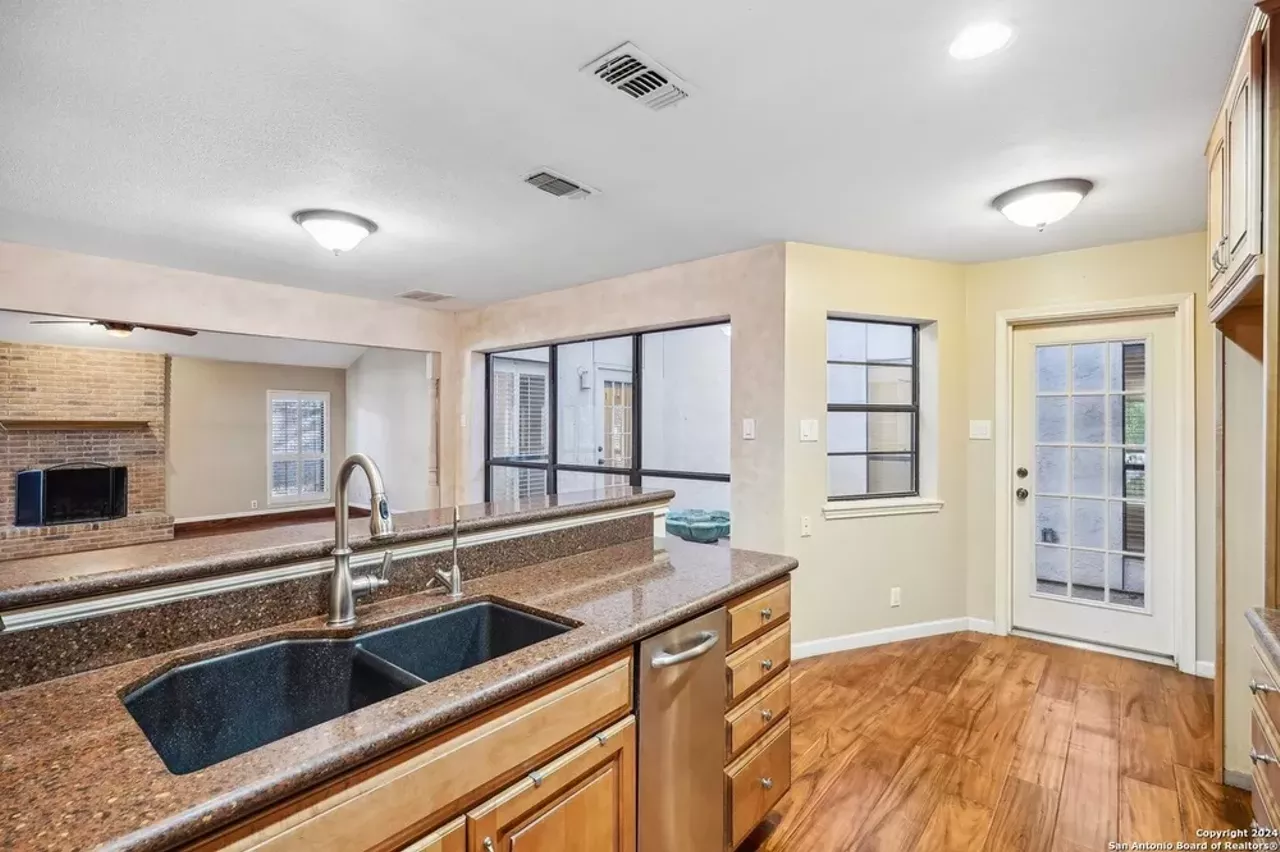 This San Antonio 1970s time capsule home for sale has a covered atrium ...