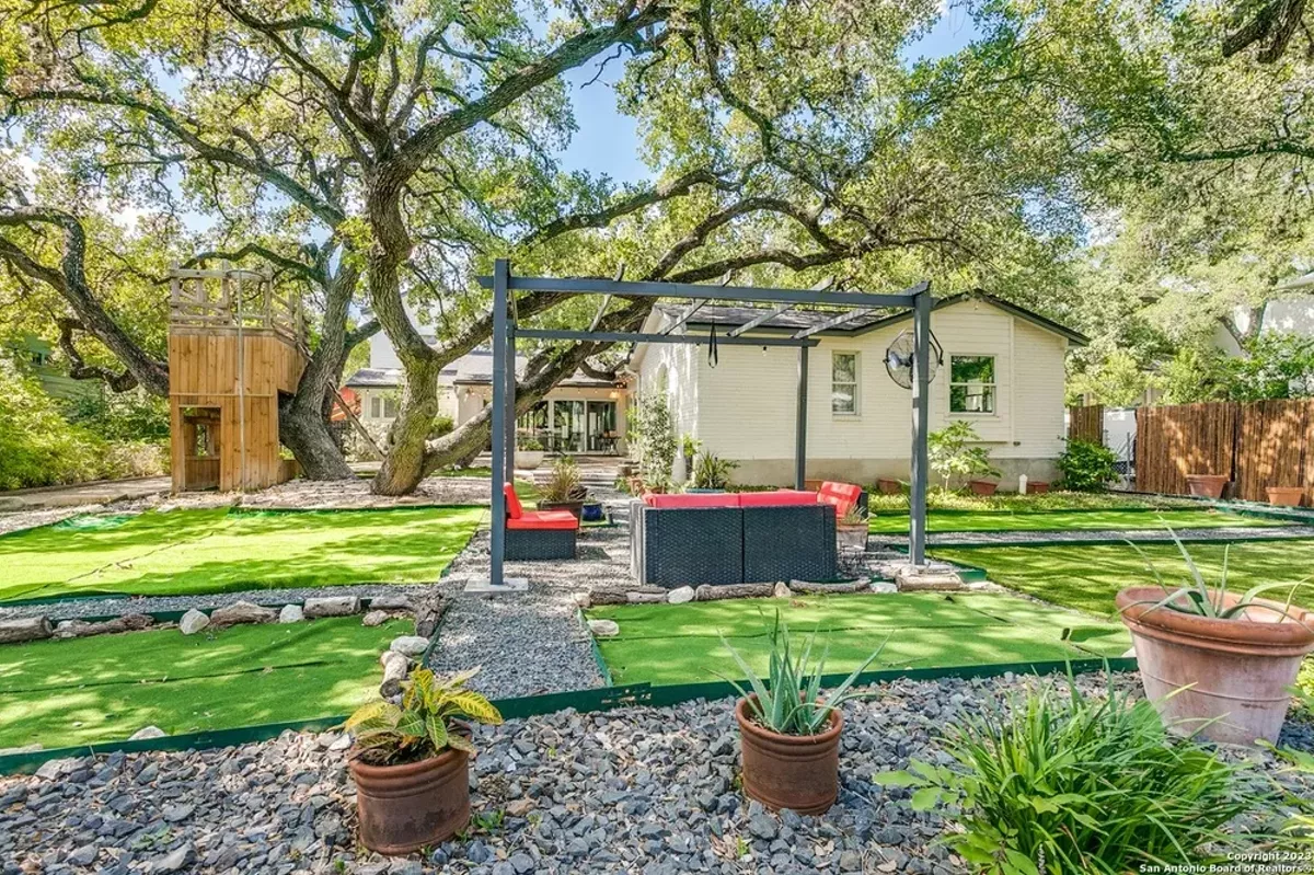 This San Antonio home comes with a two-story library featuring etched ...